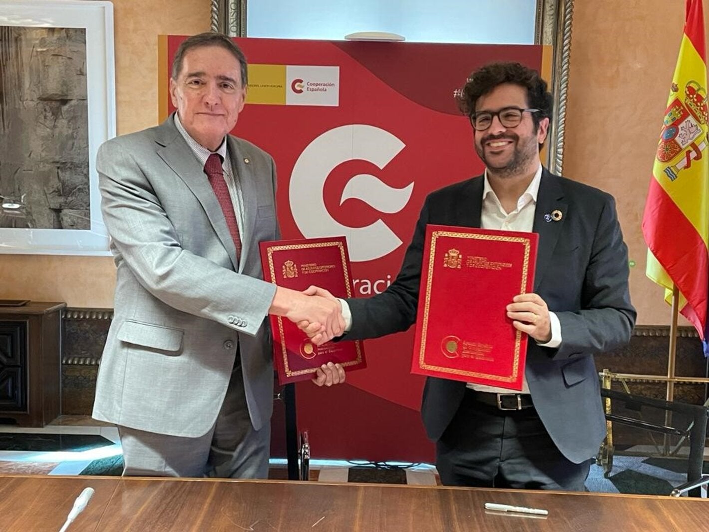 PAHO Director signs cooperation agreement with AECID during official ...